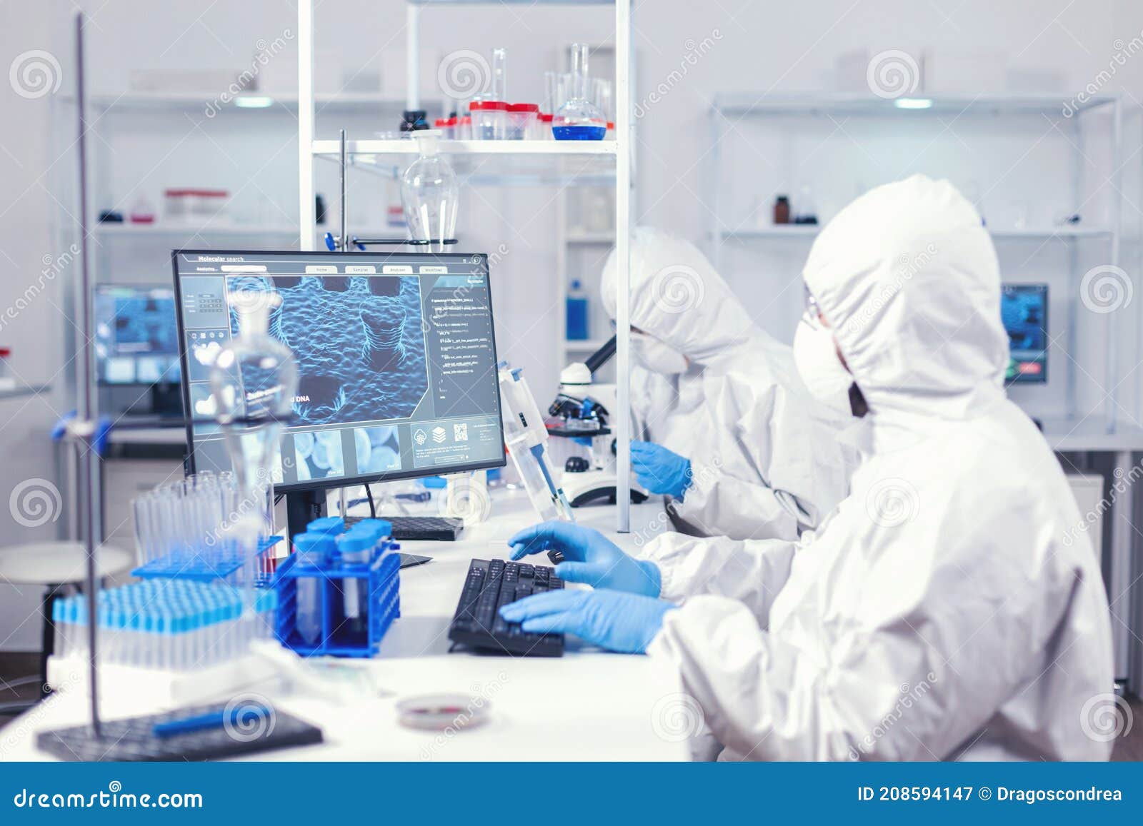 Chemist in Ppe Suit Typing on Keyborad Stock Image - Image of computer ...