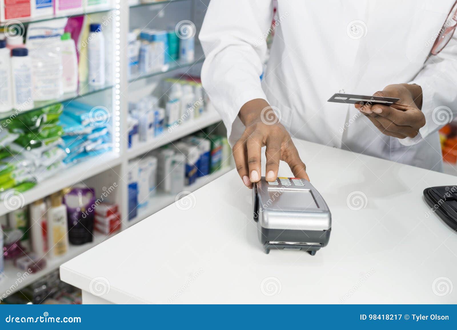 Chemist Pressing Buttons of Card Reader at Counter Stock Image - Image ...