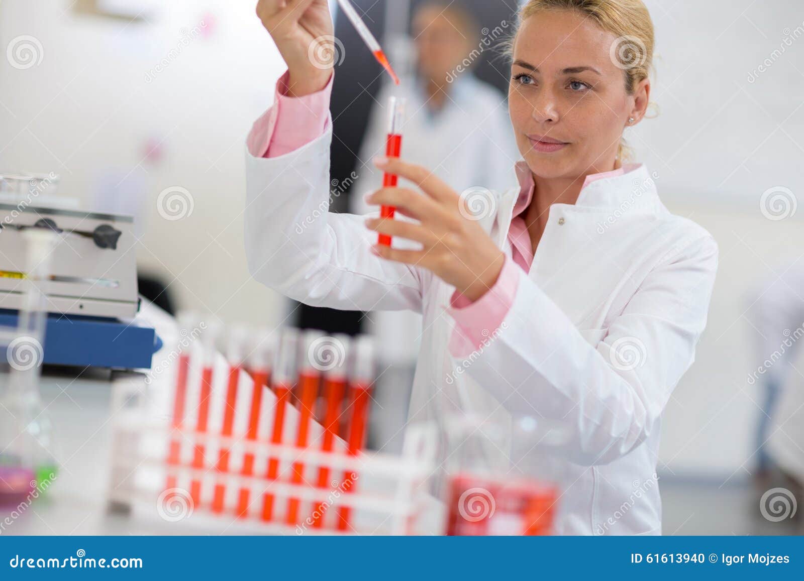 Chemist Sampling Liquid with Pipette Stock Photo - Image of coat, flask ...