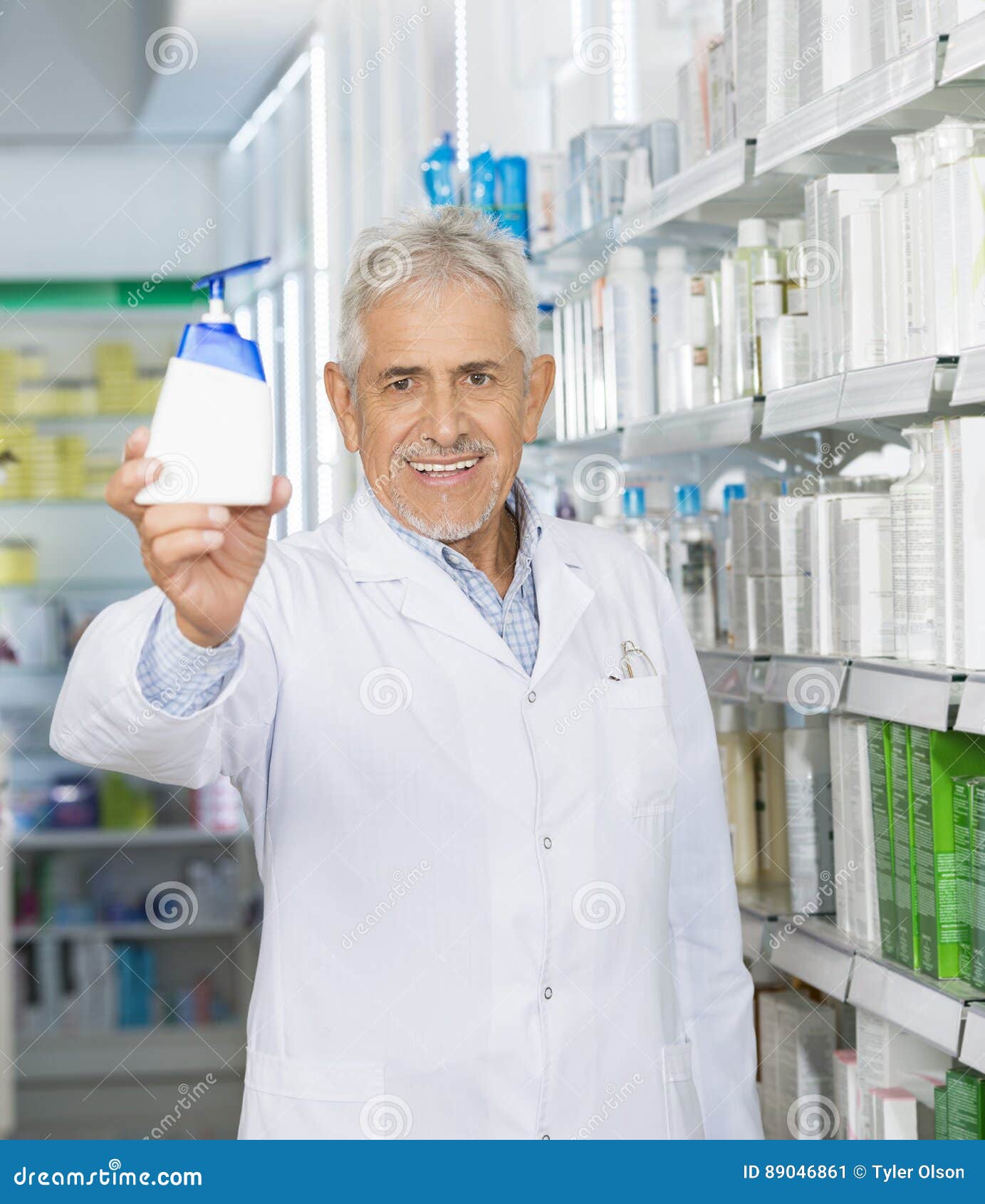 Chemist Smiling while Holding Soap Dispenser Stock Image - Image of ...