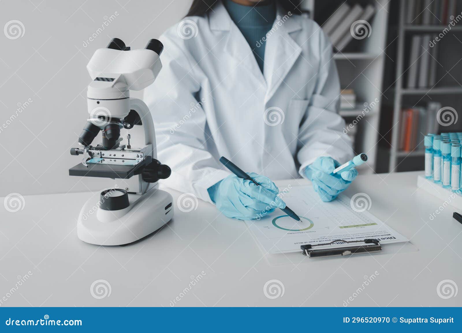 Chemist Taking Notes on Research Data, Scientist is Working in the ...