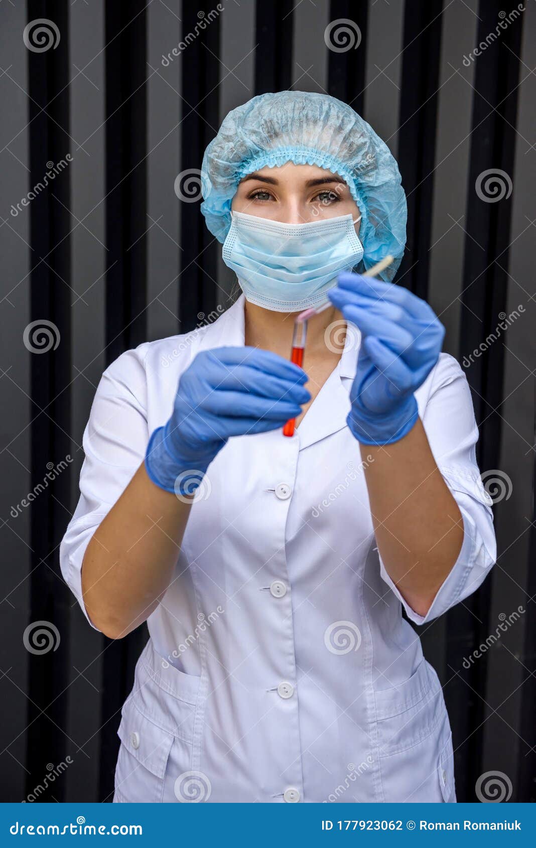 Chemist with Test Tubes Posing in Laboratory while Making Science ...