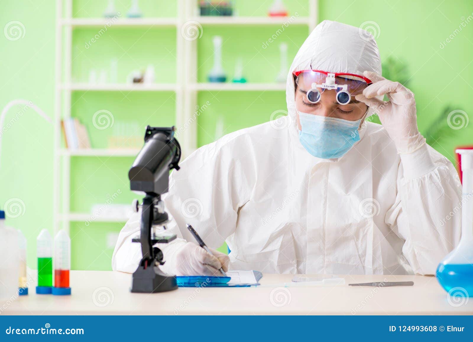 The Chemist Working in the Lab on New Experiment Stock Photo - Image of ...