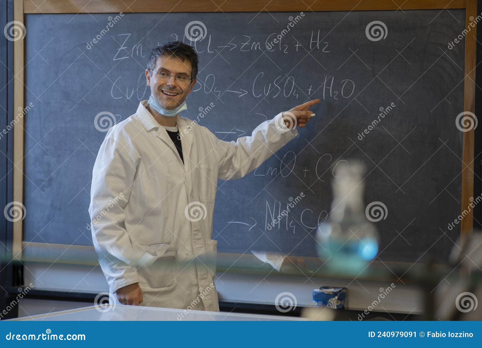 Chemistry Professor Explains School Chemistry Lesson at the Blackboard ...