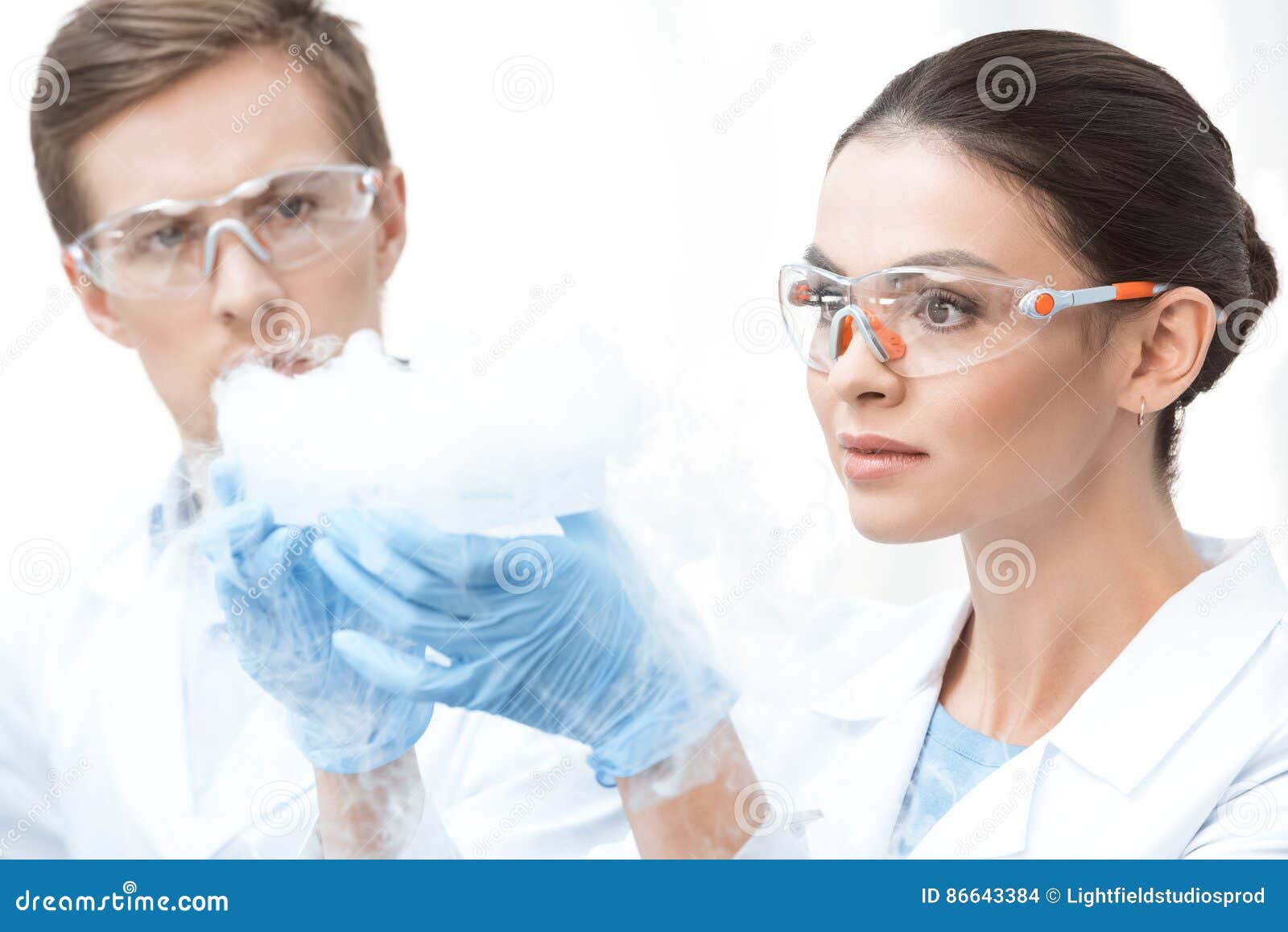 Chemists in Protective Glasses Making Experiment with Liquid Nitrogen ...