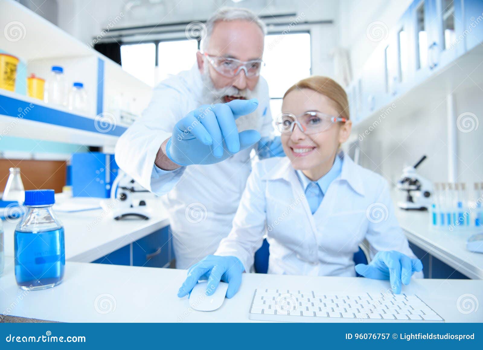 Chemists in Uniform Working in Lab with Computer Mouse and Keyboard ...