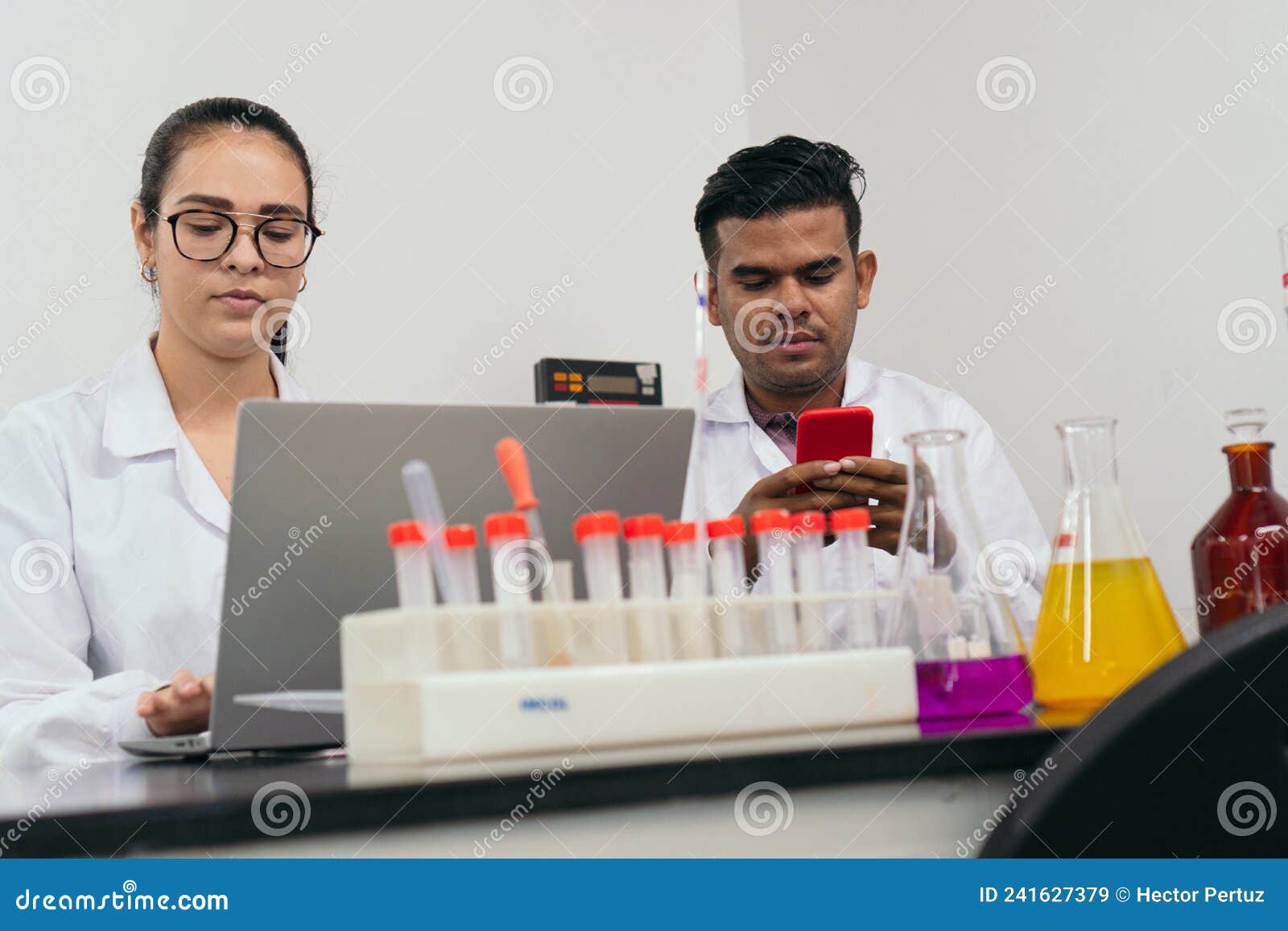 Chemists Using a Computer in a Chemistry Lab Stock Image - Image of ...