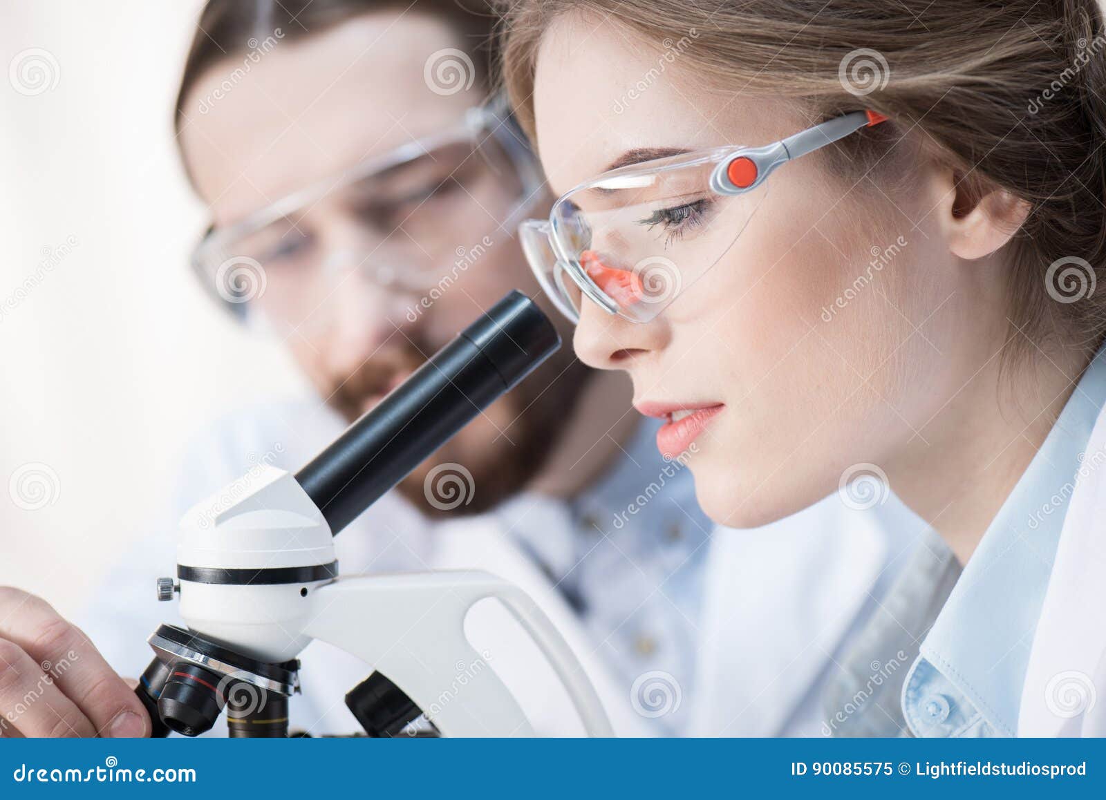 Chemists Working with Microscope Stock Image - Image of experiment ...