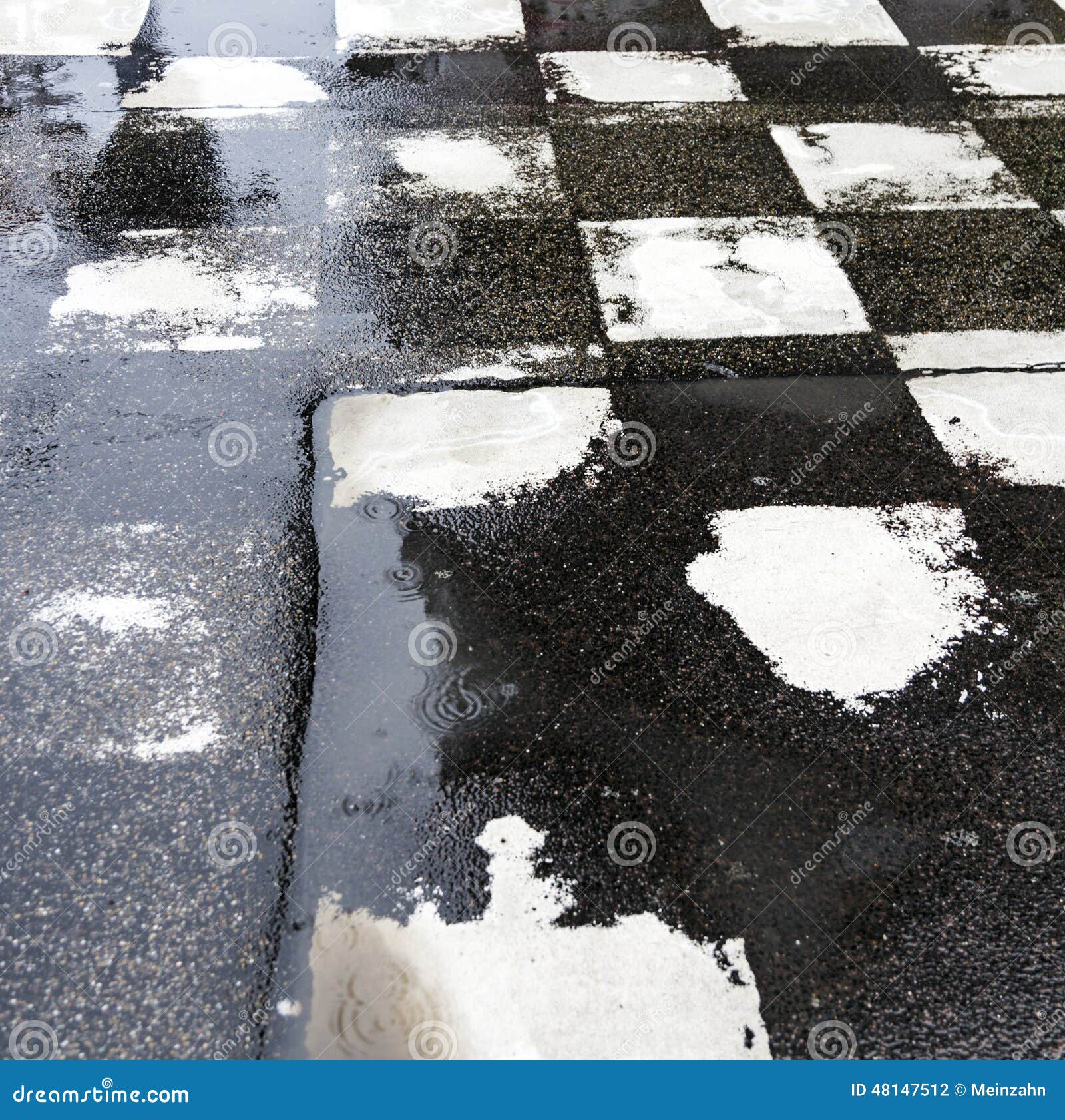 Chequered Pattern Painted on Asphalt Stock Photo - Image of rain, macro ...