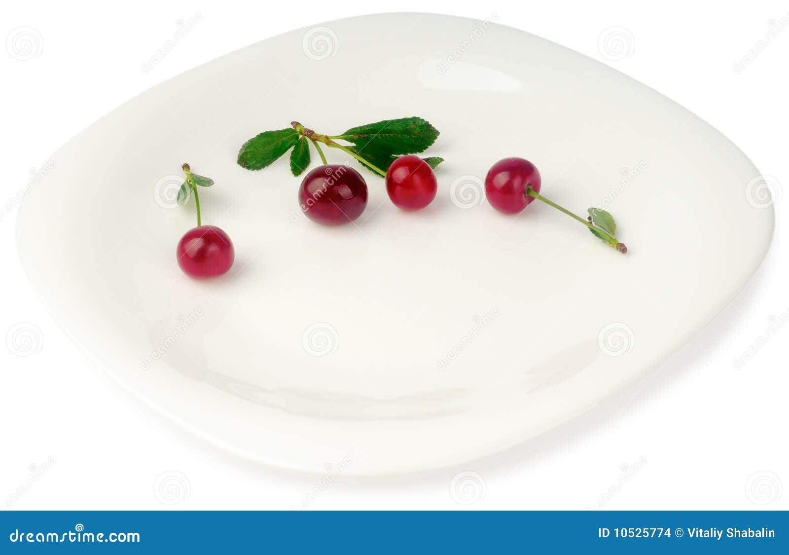 Cherries on white plate stock photo. Image of cherry - 10525774