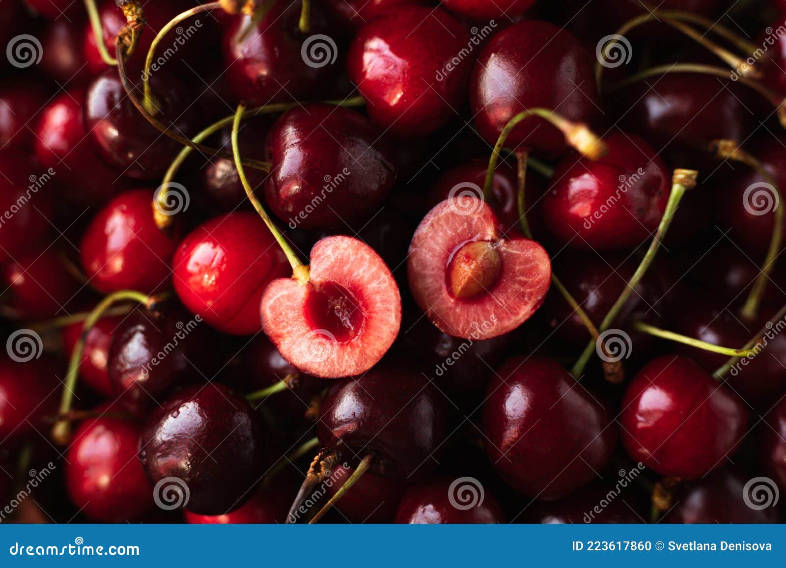 The Cherry is Close. a Cut Cherry Berry with Cuttings on Top of Other ...