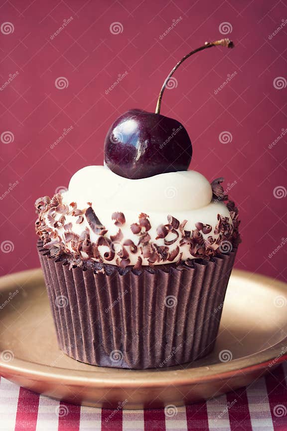 Cherry cupcake stock photo. Image of plate, buttercream - 16648032