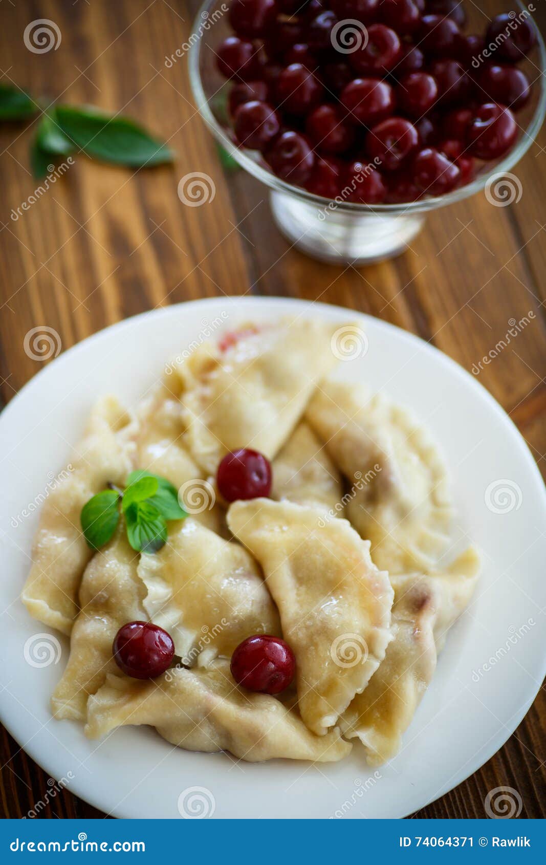 Cherry dumplings with mint stock image. Image of homemade - 74064371