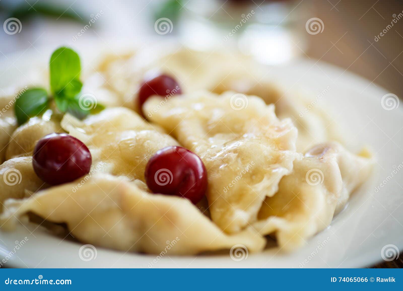 Cherry dumplings with mint stock photo. Image of diet - 74065066