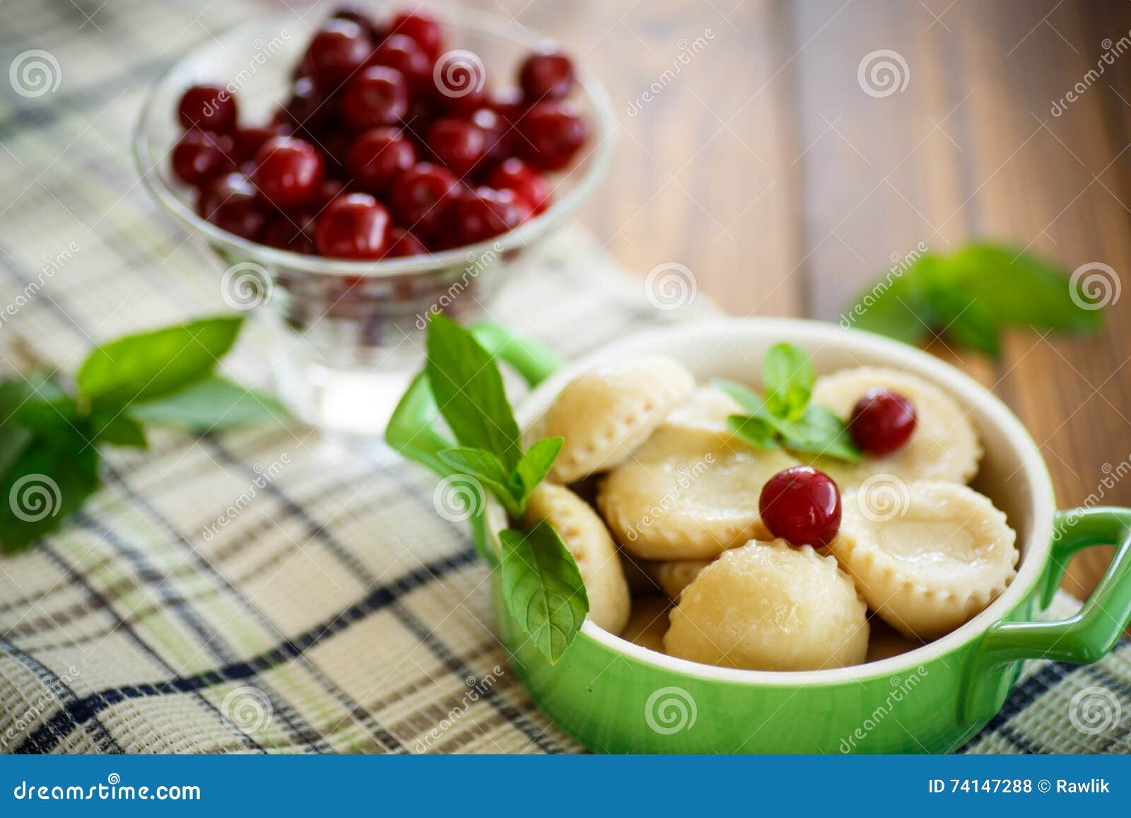Cherry dumplings with mint stock photo. Image of eating - 74147288