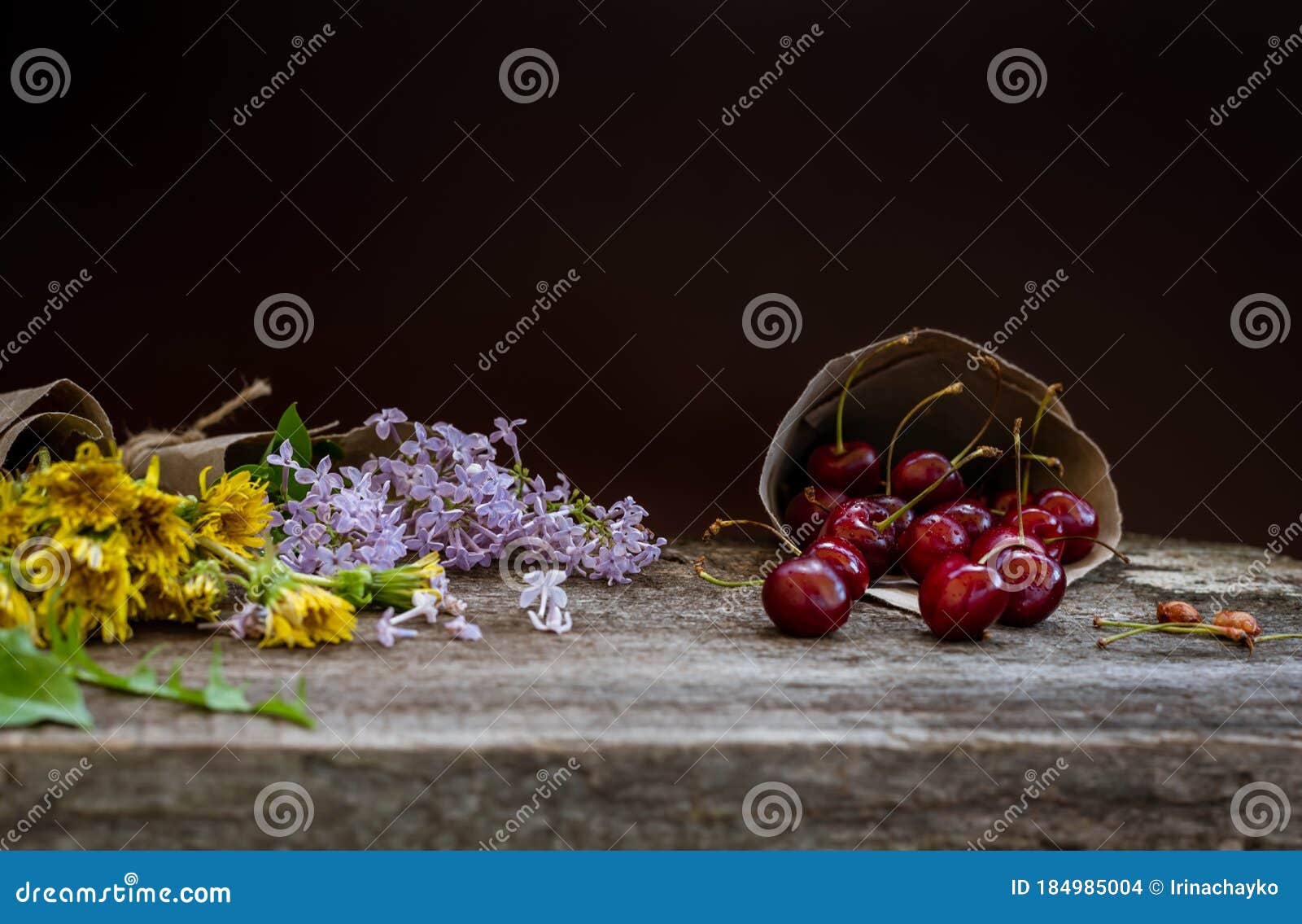 Cherry and Flowers on a Wooden Craft Table Stock Photo - Image of brown ...