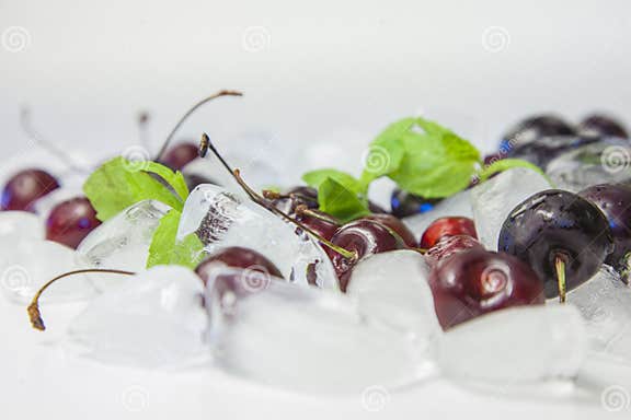 Cherry and ice cubes stock photo. Image of background - 55335354