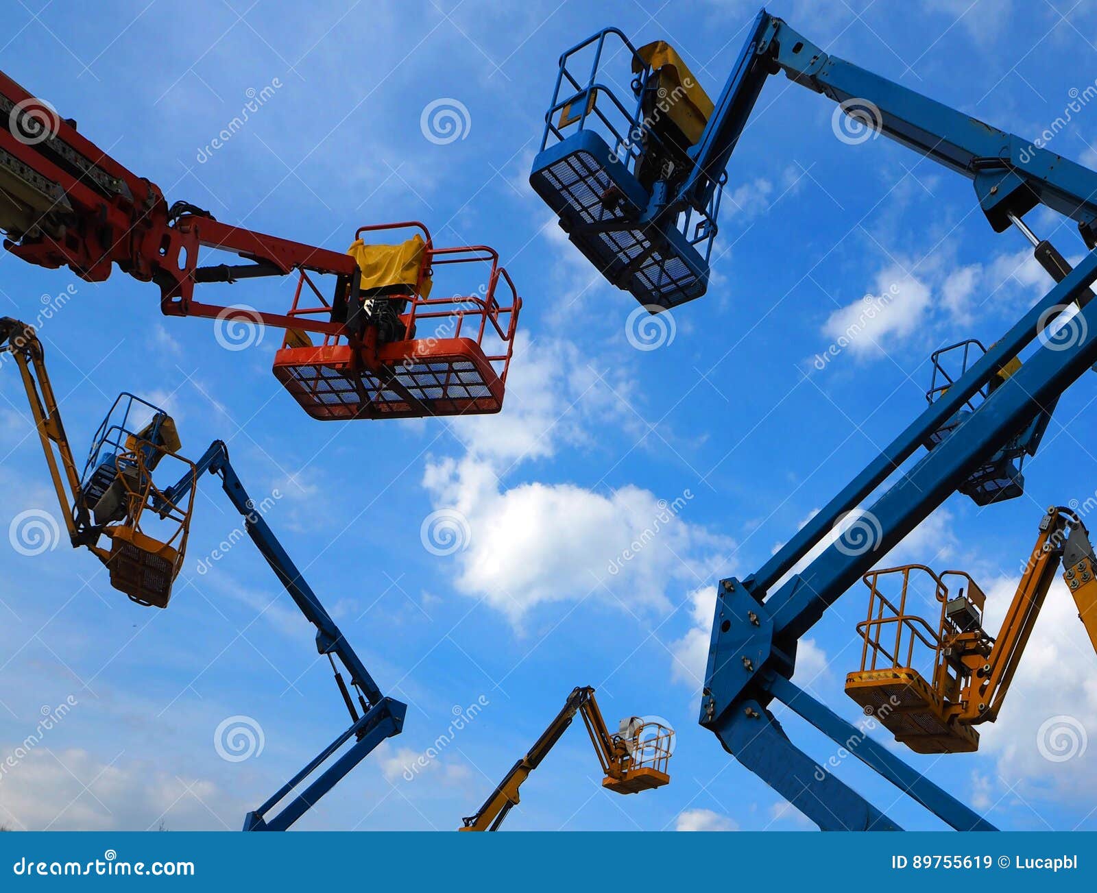 A Group of Cherry Pickers, Aerial Work Platforms, Seen from Below Stock ...