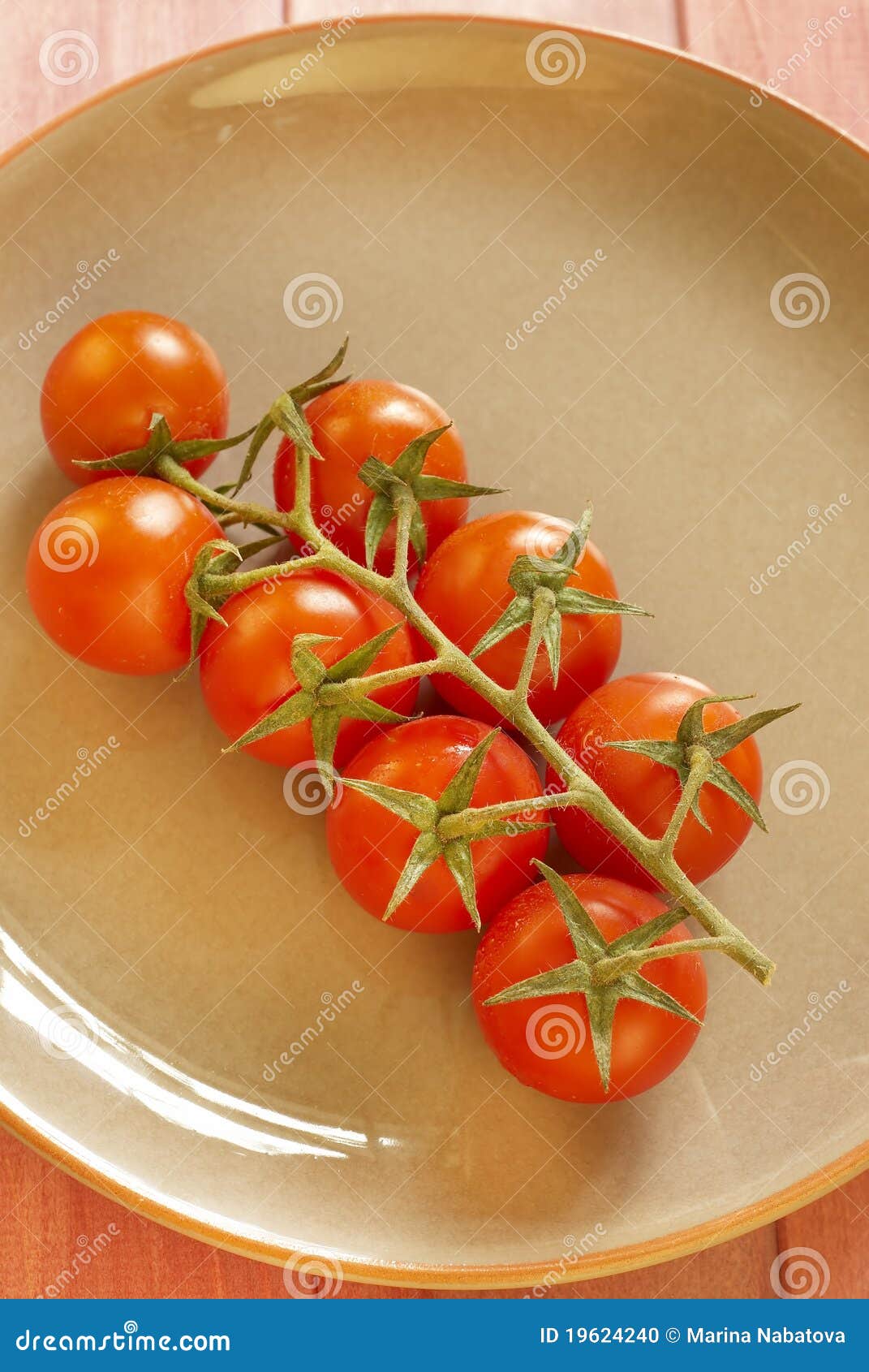 Cherry tomatoes on plate stock photo. Image of group - 19624240