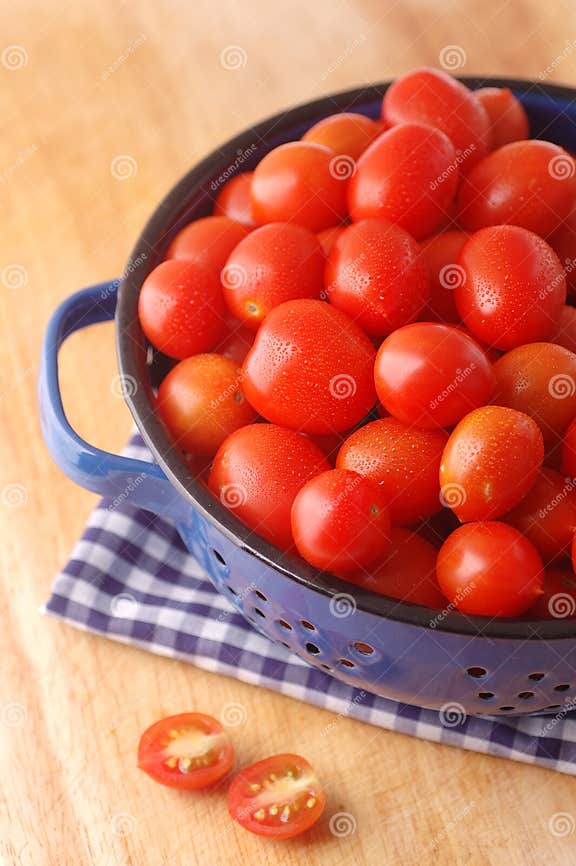 Cherry Tomatos in a Strainer Stock Photo - Image of juicy, food: 23469002