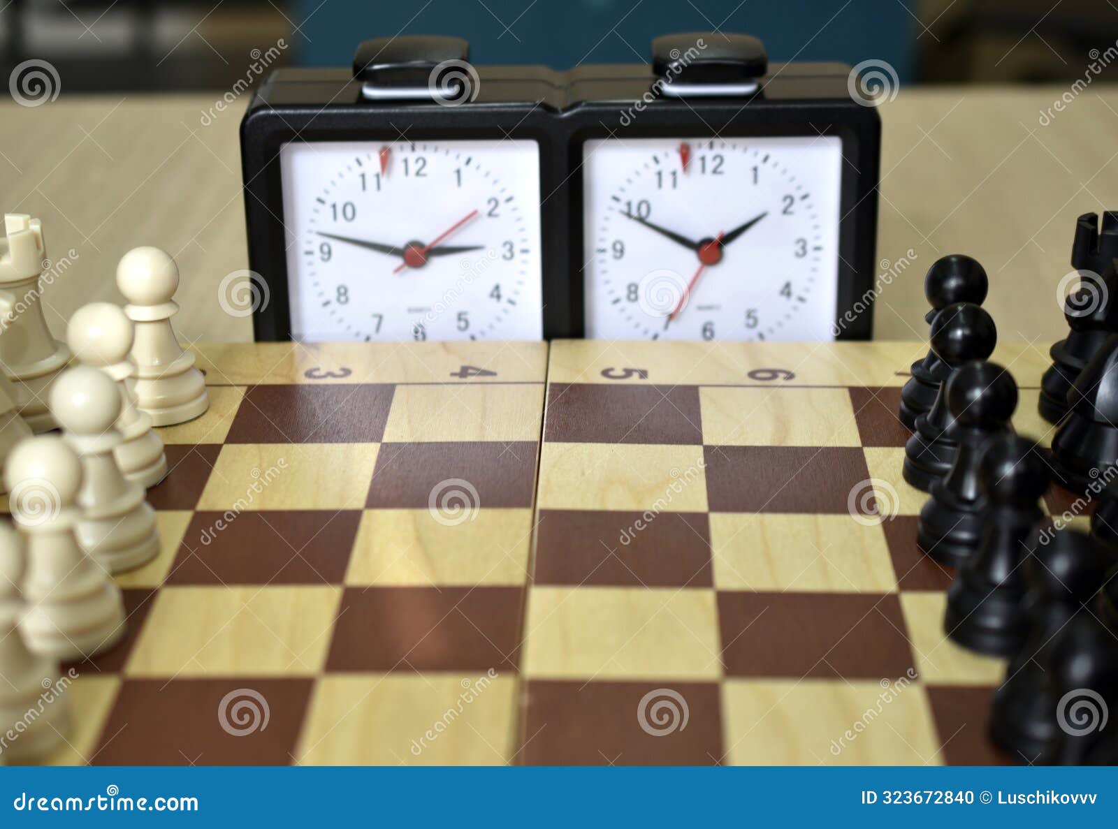 A Chess Board and a Chess Clock. Chess Competitions Stock Photo - Image ...