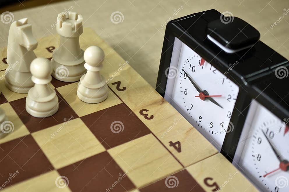 A Chess Board and a Chess Clock. Chess Competitions Stock Image - Image ...
