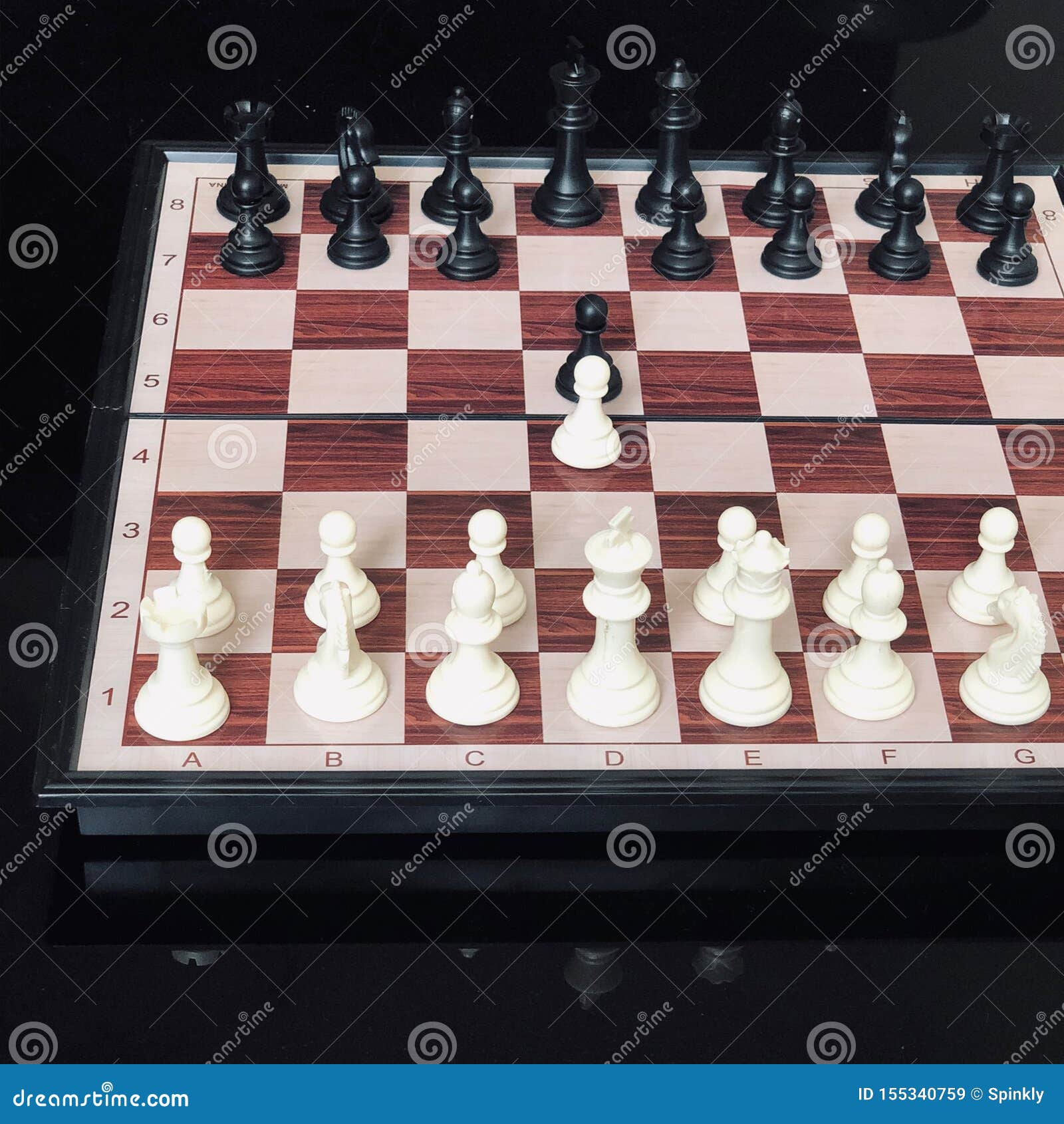 Chess Board Close Up Showing Part of Chess Pieces Stock Image - Image ...