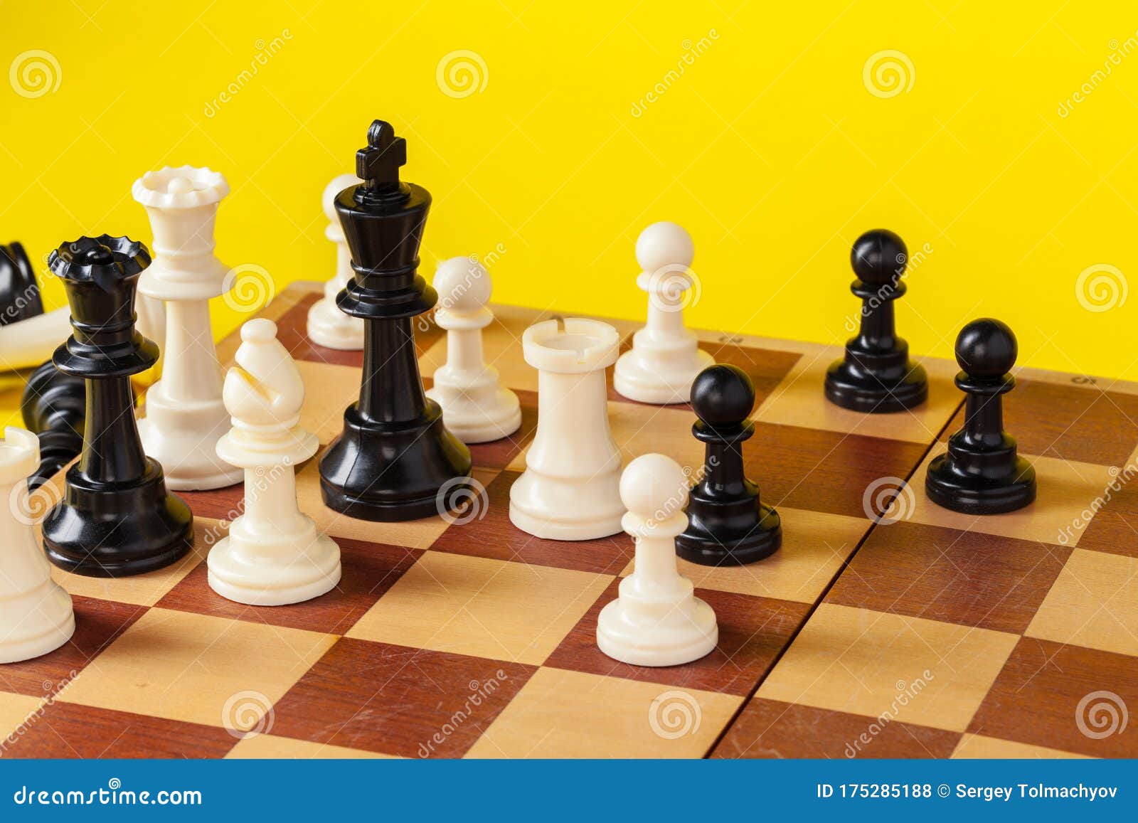 Chess Board with Figures on Yellow Background Top View Copy Space Stock ...