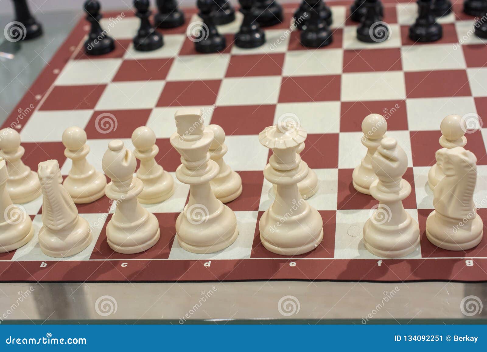 Chess Board on a Glass Table on Display Stock Image - Image of ...
