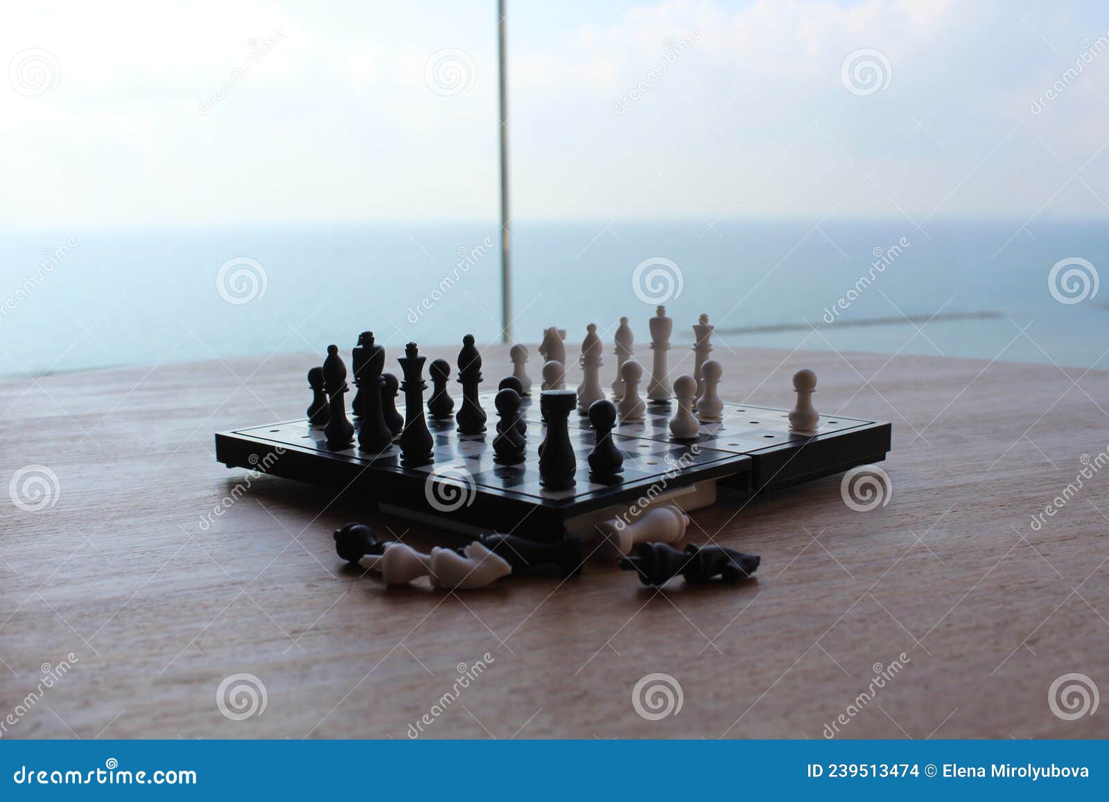 Chess Board with Chess Pieces View To the Sea Stock Photo - Image of ...