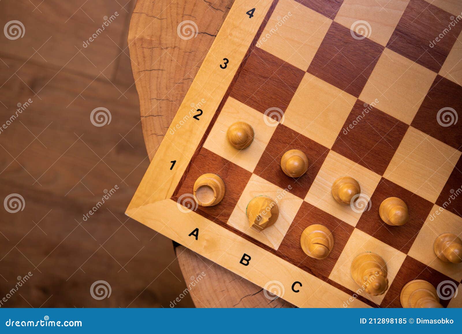 Chess board on a table stock image. Image of knight - 212898185