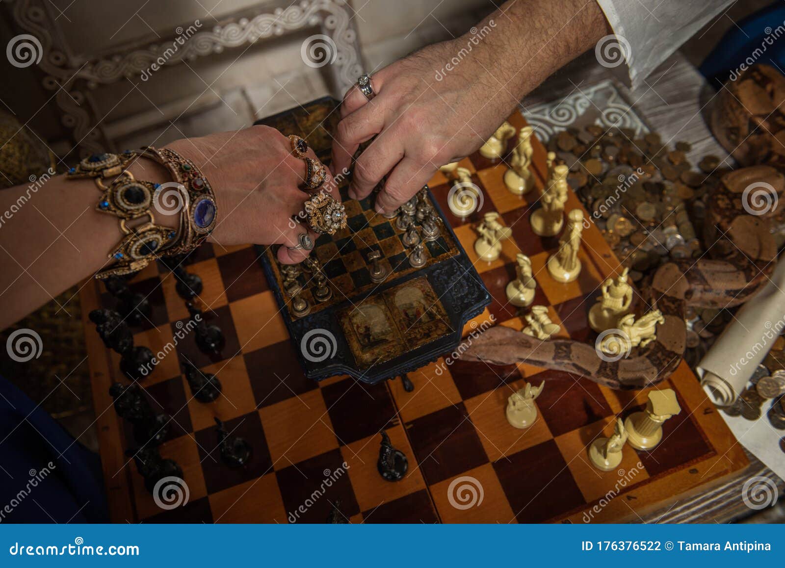 Chess Game Hands with Decorations and a Snake Stock Photo - Image of ...
