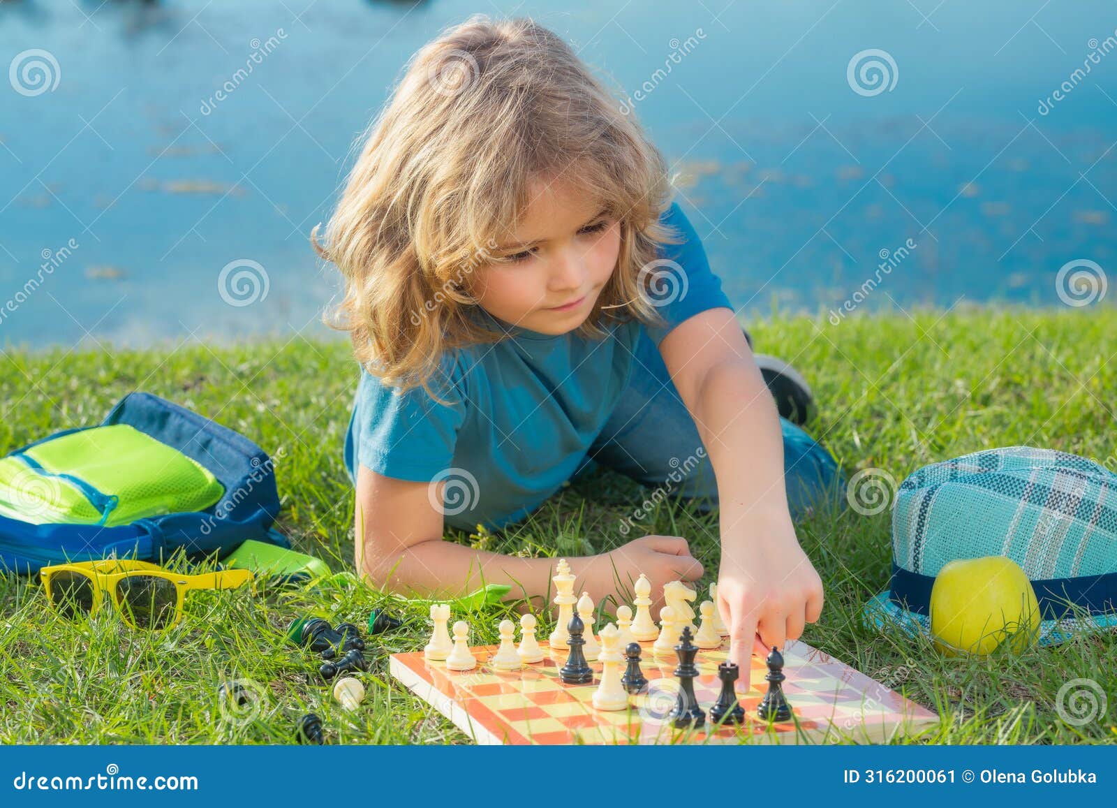 Chess Game for Kids. Child Playing Chess Outdoor in Park. Stock Image ...