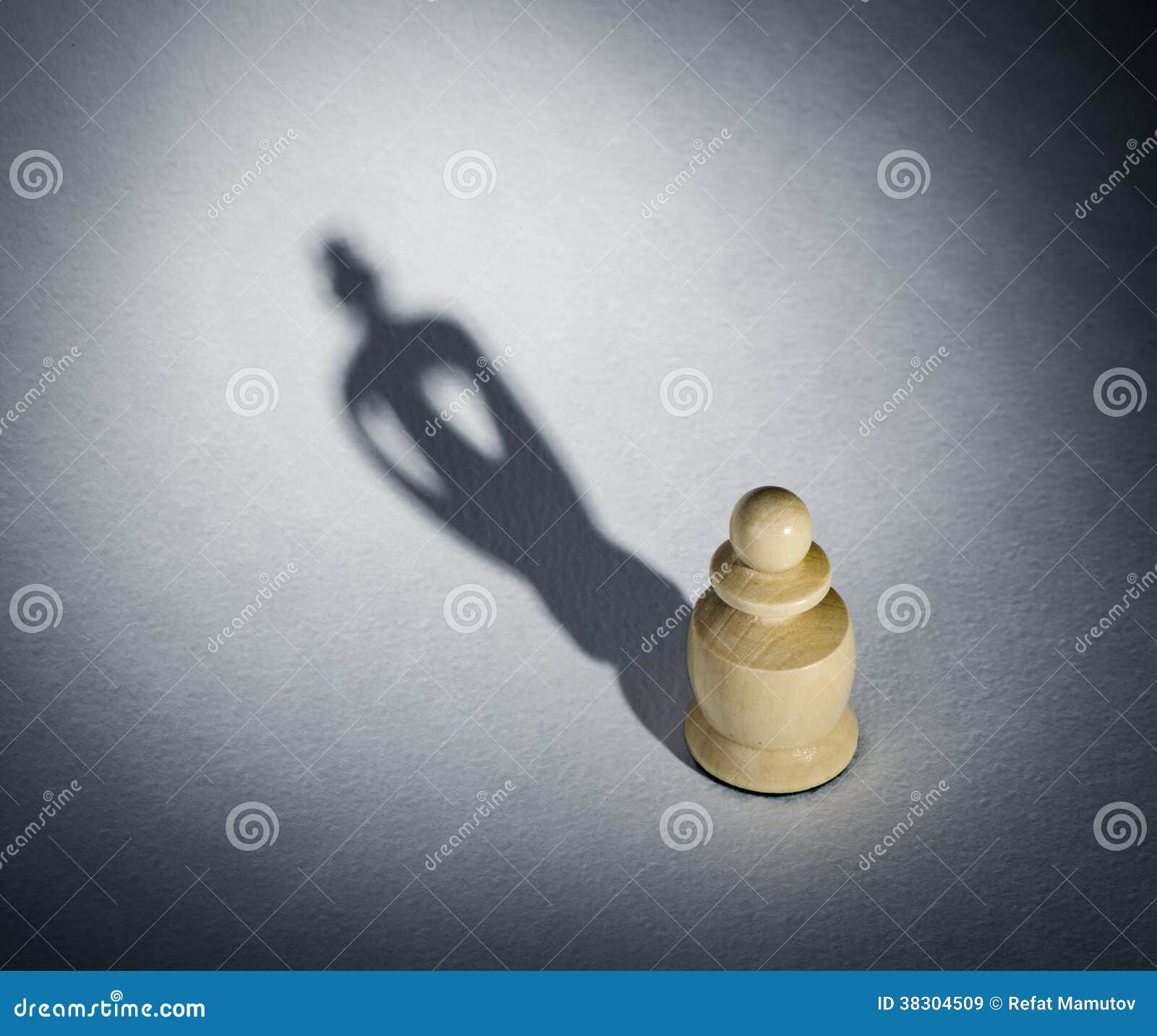 A Chess Pawn Casting A King Piece Shadow In Dark Concept Of Strength ...