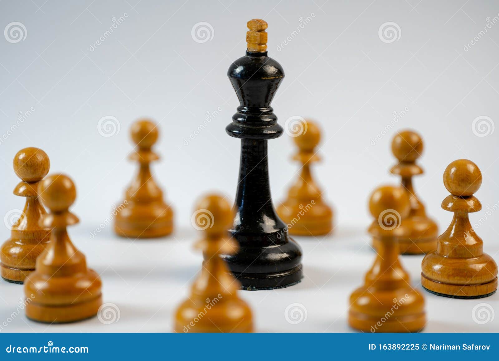 Chess Pieces, Black King Surrounded by White Pawns Stock Image - Image ...