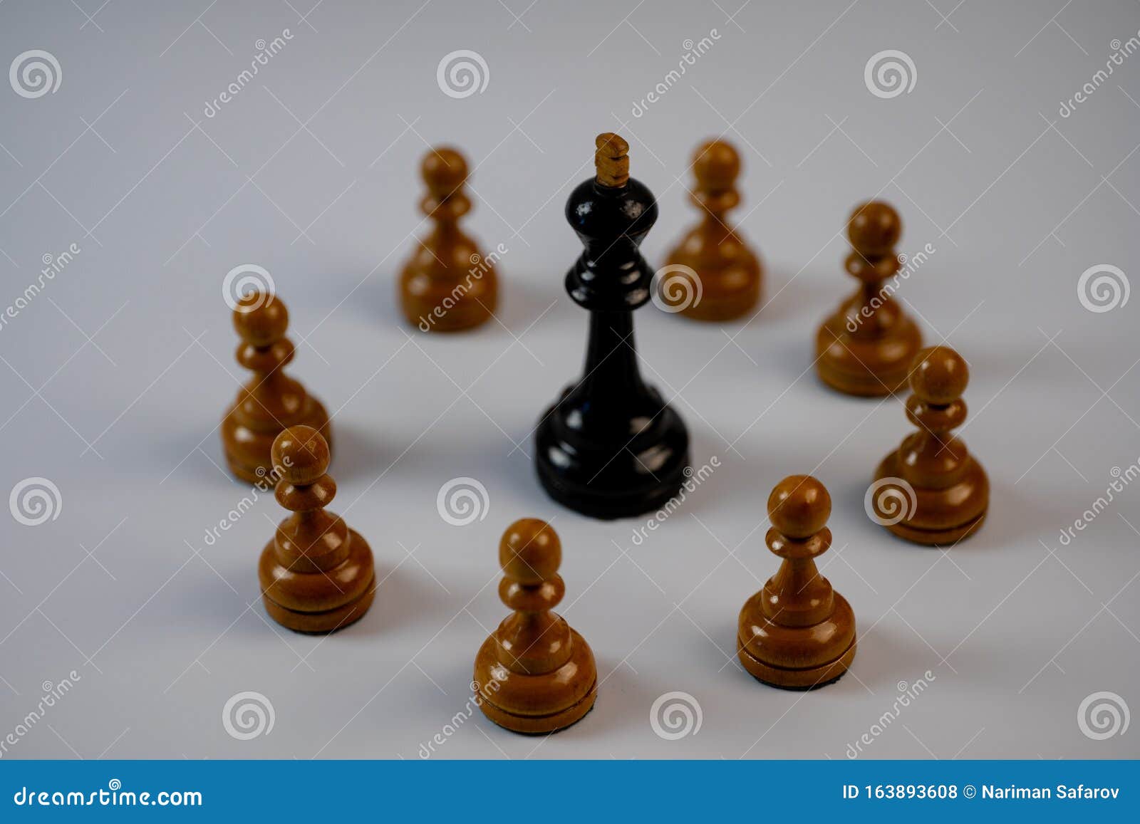 Chess Pieces, Black King Surrounded by White Pawns Stock Photo - Image ...