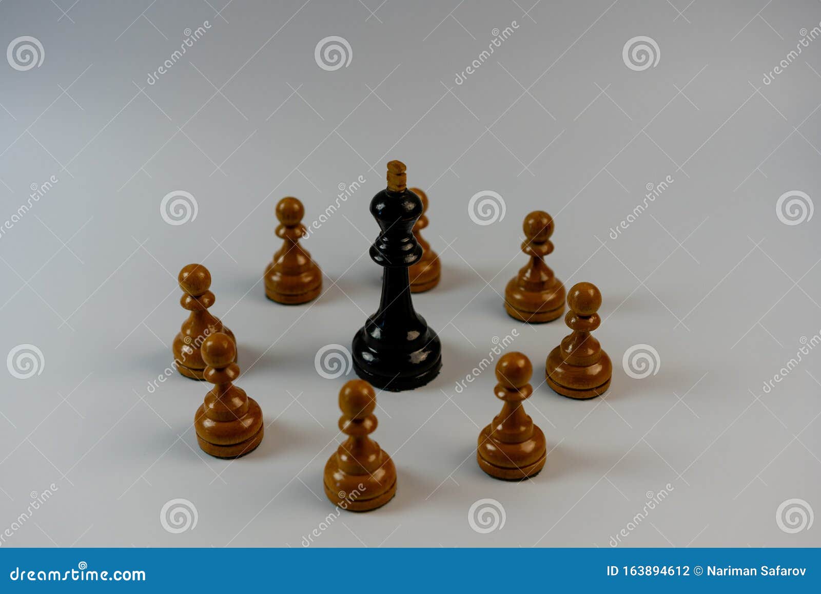 Chess Pieces, Black King Surrounded by White Pawns Stock Photo - Image ...