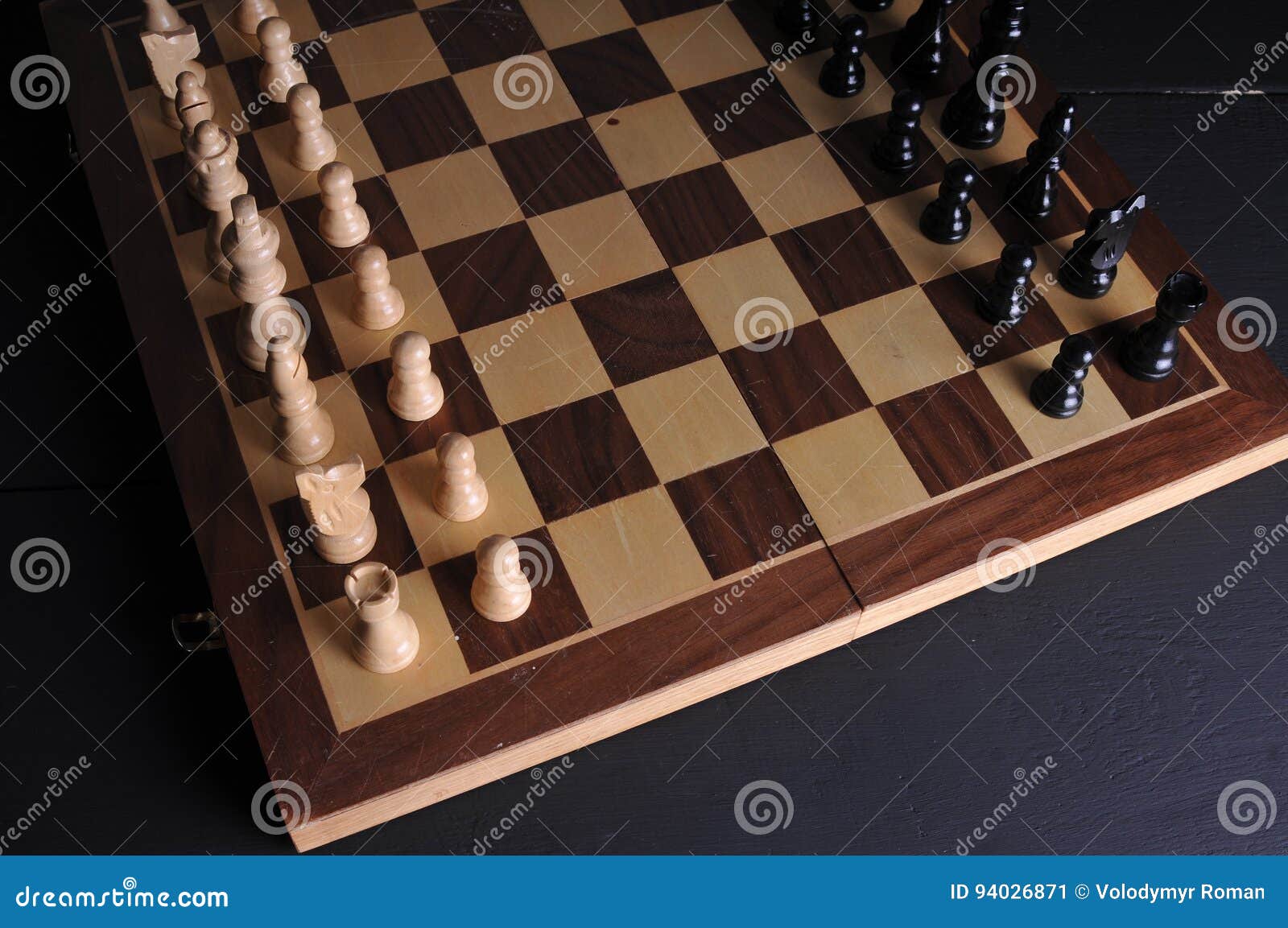 Chess pieces on the board stock image. Image of plank - 94026871