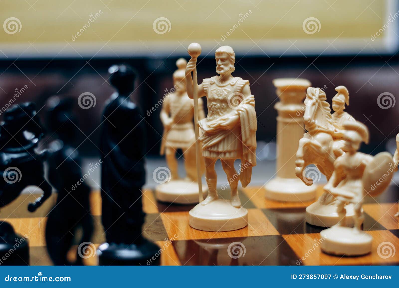 Chess Pieces are on the Board. the Queen and King in Chess are in a ...