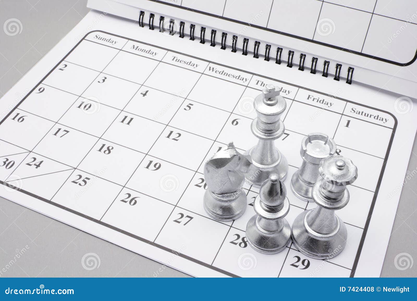 Chess Pieces on Calendar stock photo. Image of pieces - 7424408