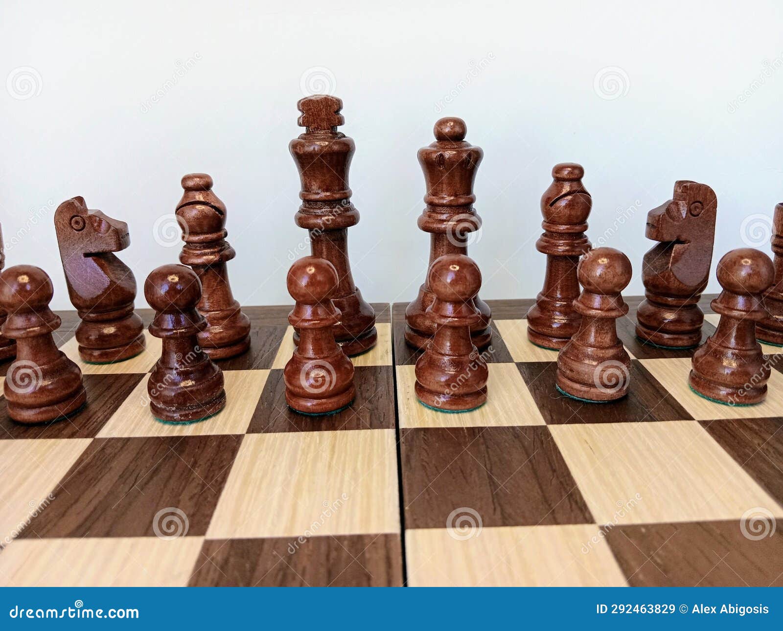Chess Pieces on a Checkered Chess Board Stock Image - Image of objects ...
