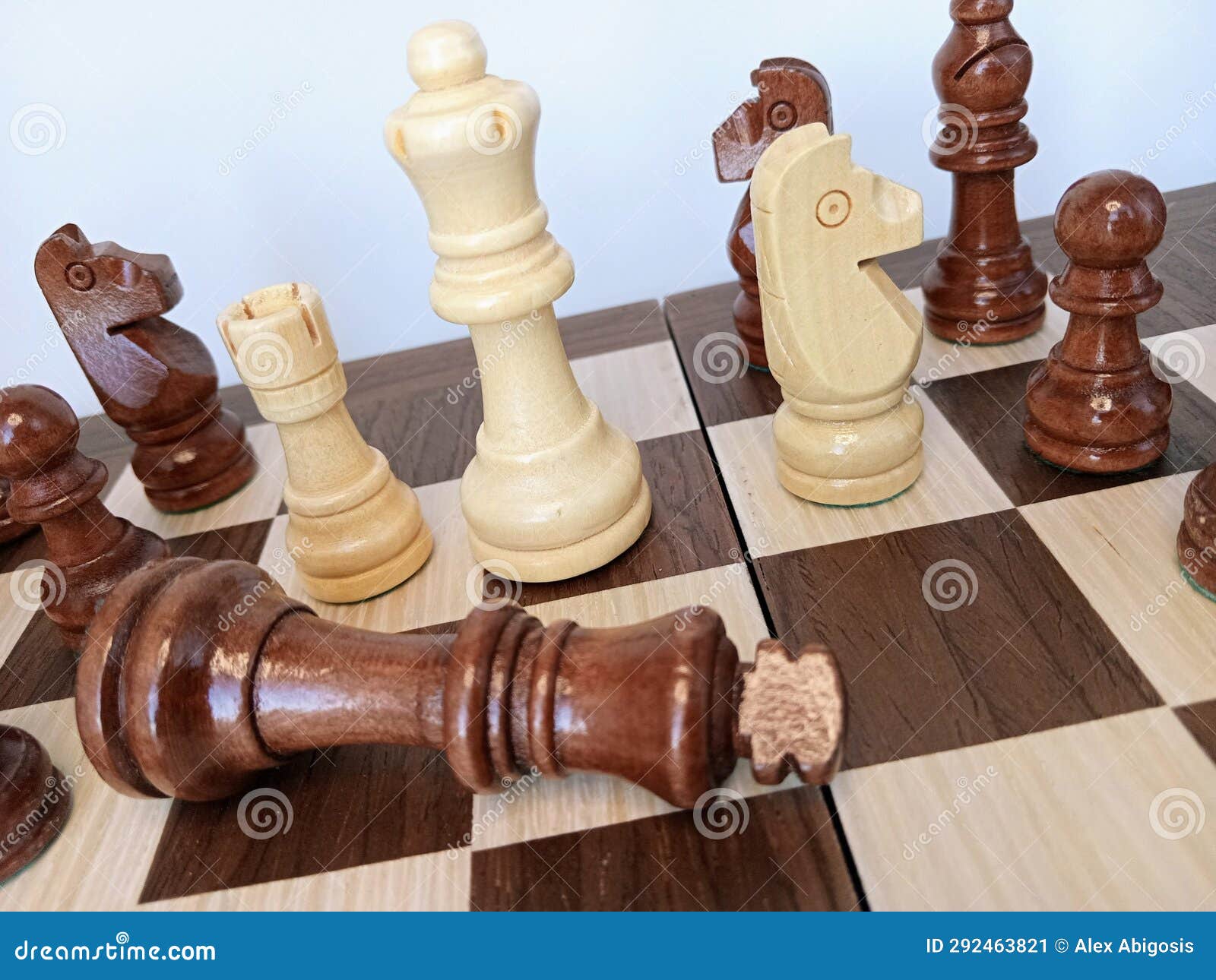 Chess Pieces on a Checkered Chess Board Stock Image - Image of ...