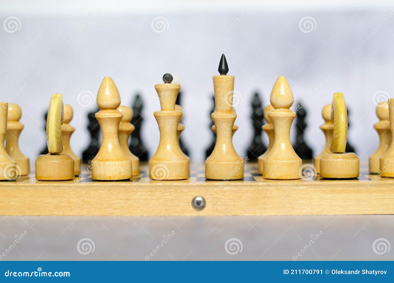 Chess Pieces on a Chessboard Side View. White Pieces in the Foreground ...