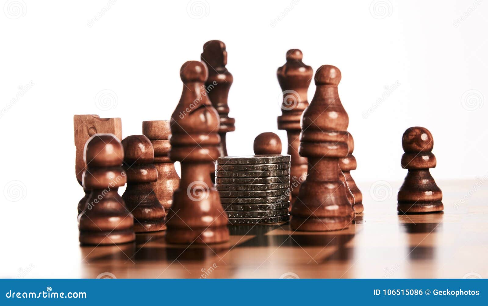 Chess Pieces with Coins Stack on the Chessboard Stock Photo - Image of ...