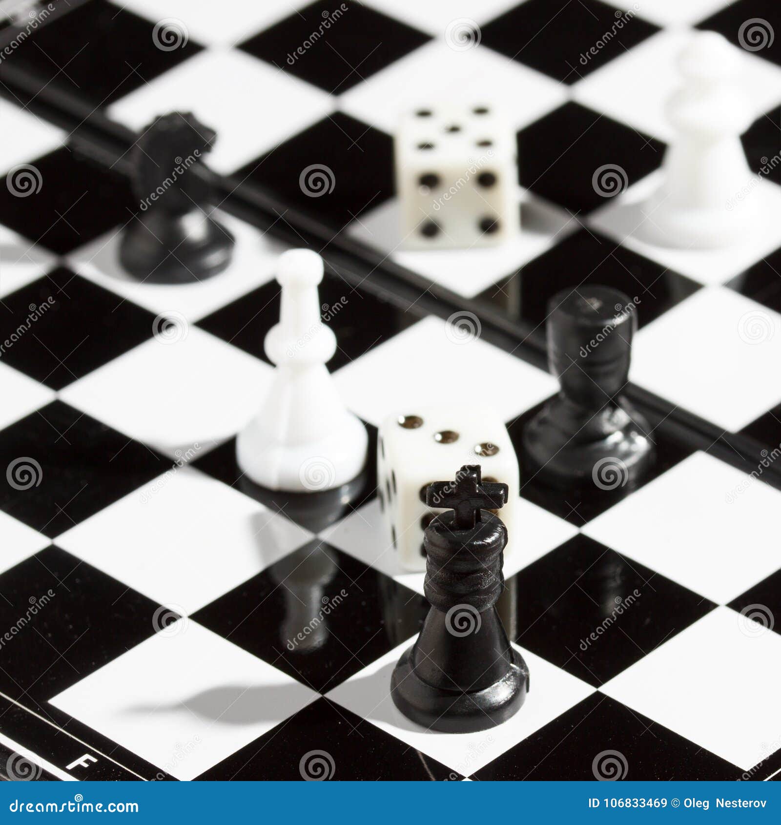 Chess pieces and dice stock image. Image of building - 106833469