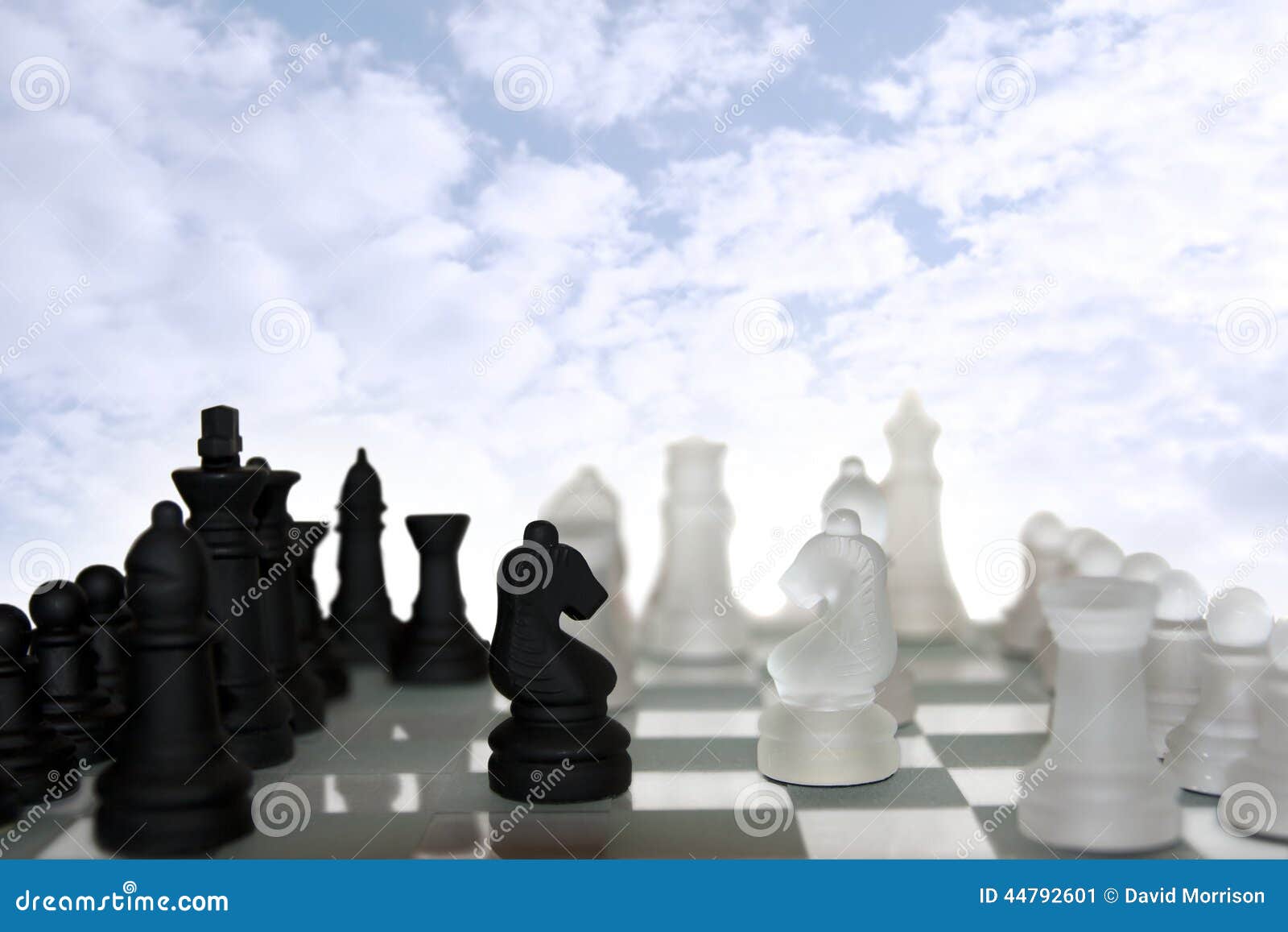 Chess Pieces Isolated Against Blue Sky Stock Image - Image of glass ...