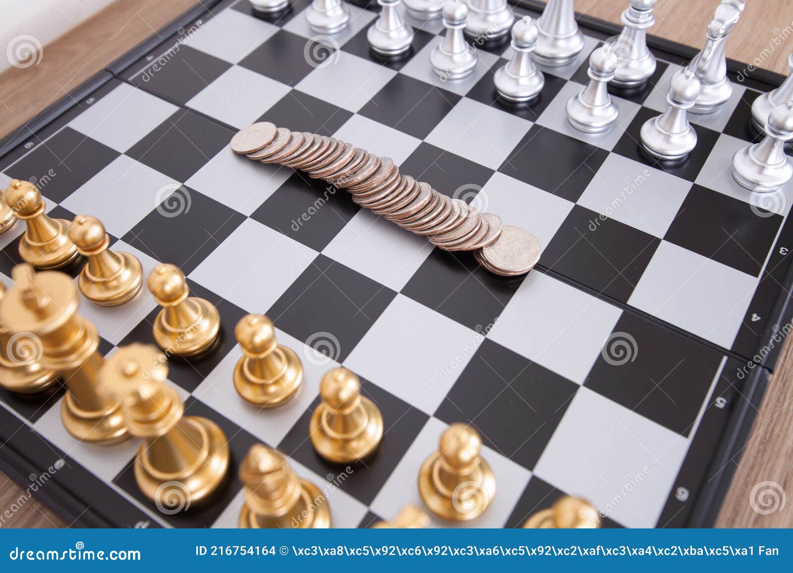 Chess Pieces Placed on the Chessboard and the Dollar Coin in the Middle ...