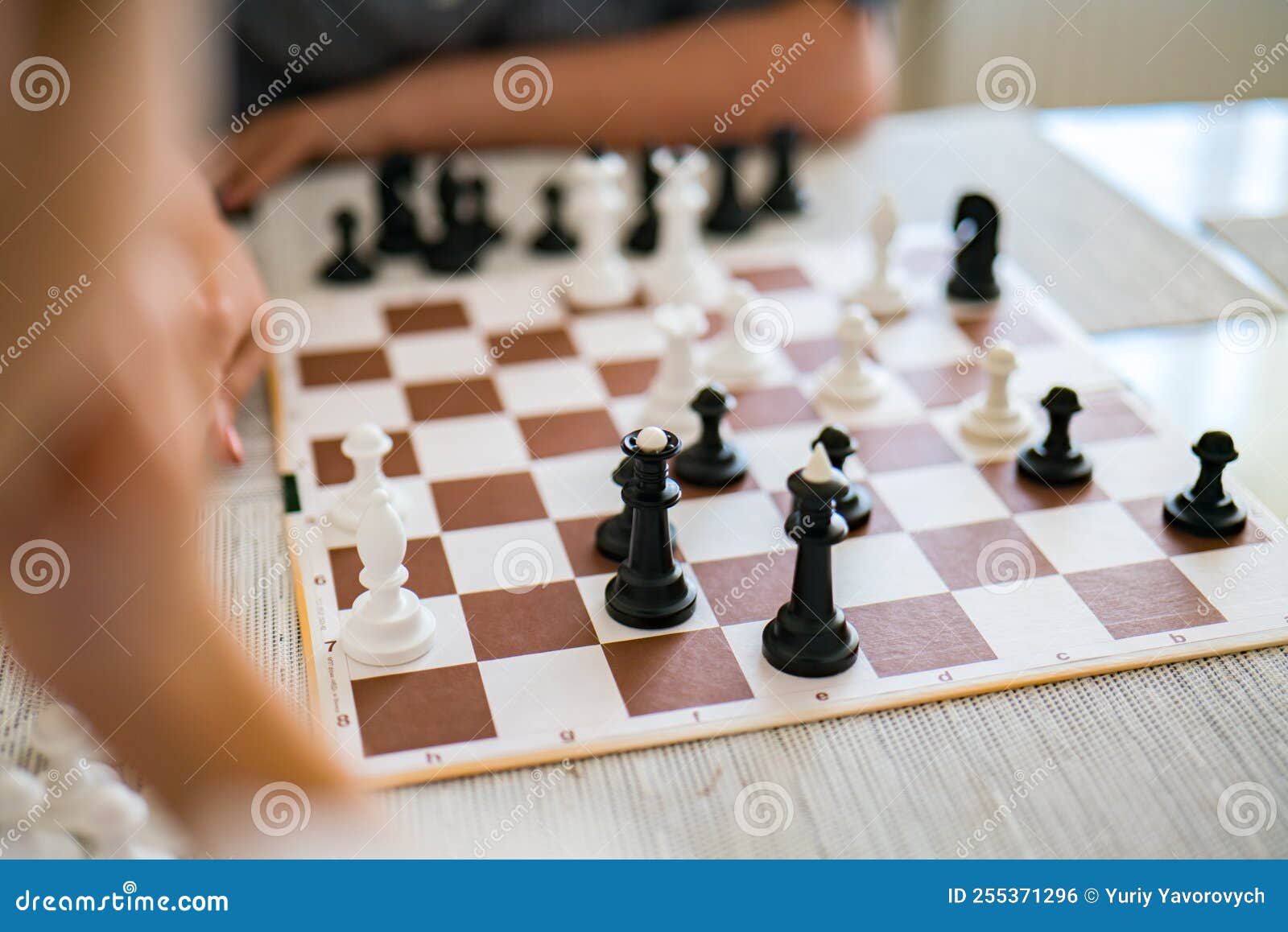 Chess Pieces Set on a Chessboard. Peoples Playing Chess Board Stock ...