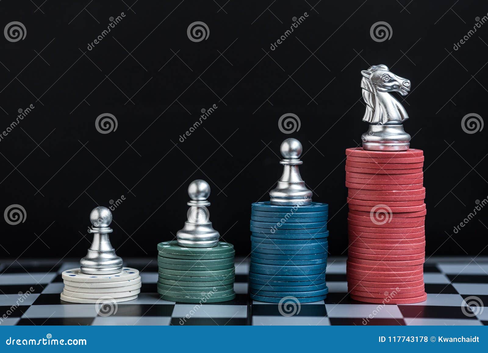 Chess Pieces on Stack of Casino Chips Stock Photo - Image of gambling ...