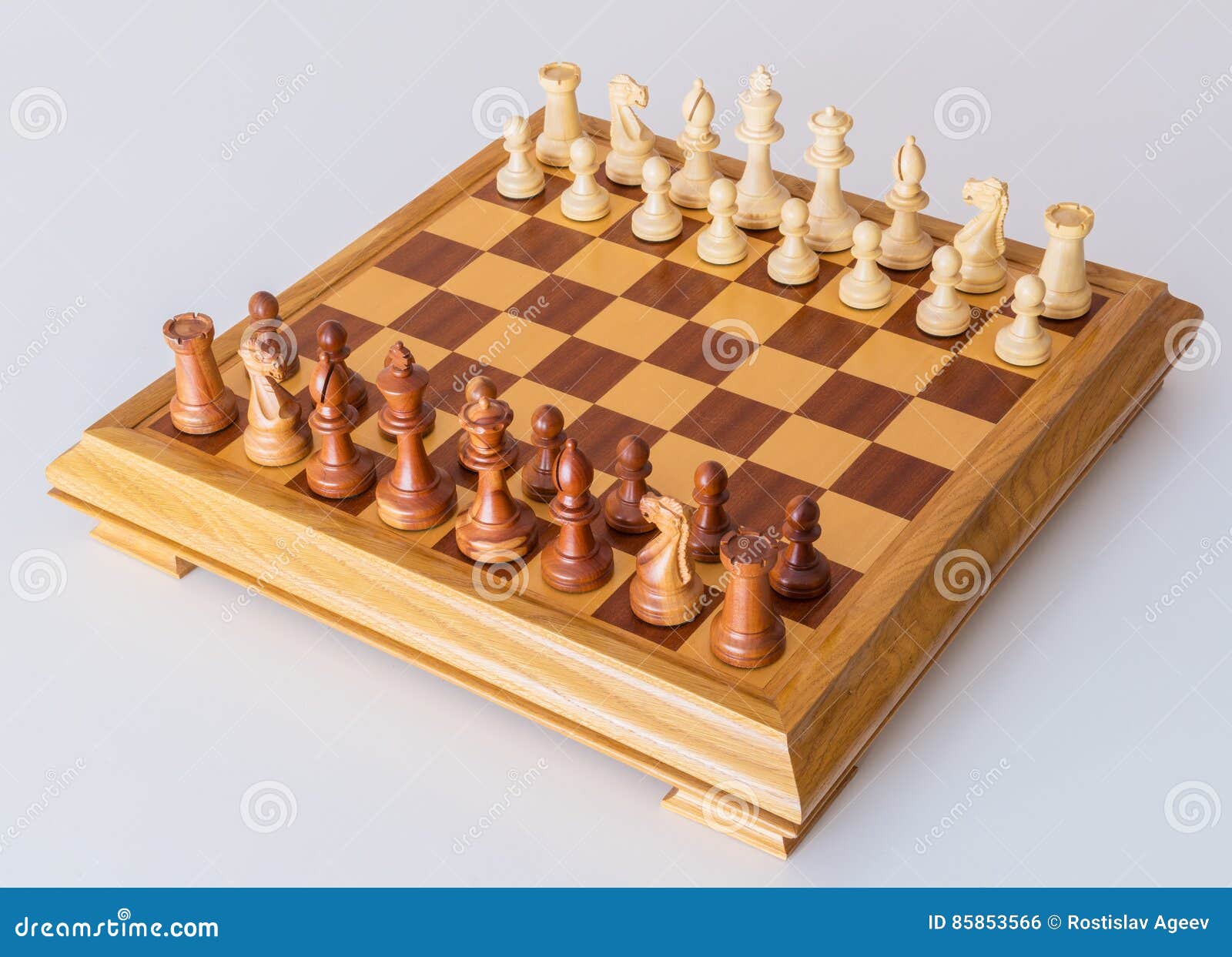 Chess Pieces in Starting Position on a Wooden Board Stock Photo - Image ...